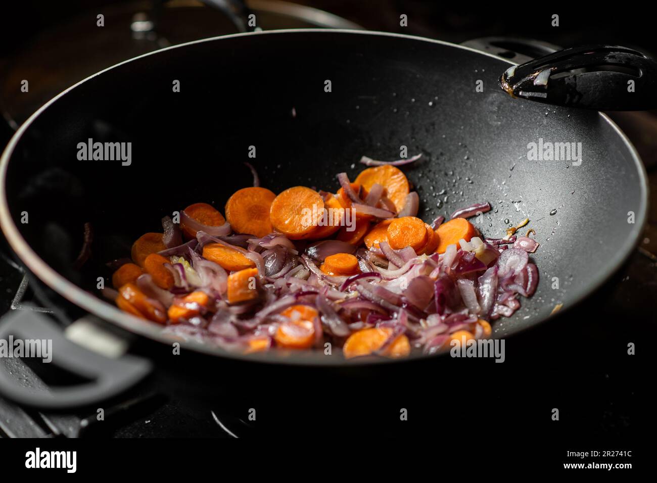 Grated carrots fried in frying hi-res stock photography and images - Alamy