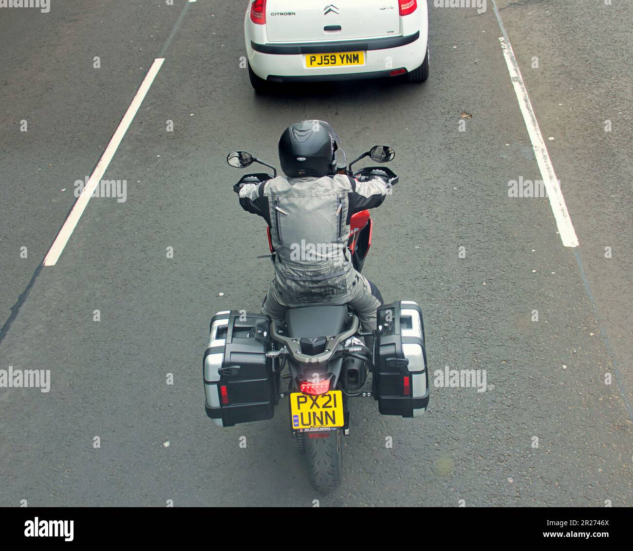 teenage motorbike motorcyclist from behind pn road Stock Photo - Alamy