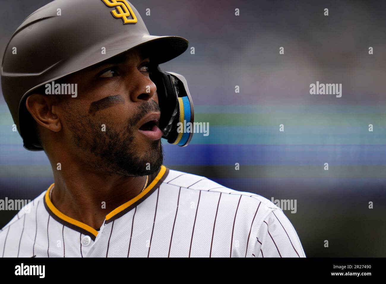 San Diego Padres' Xander Bogaerts looks on as he fouls out while ...