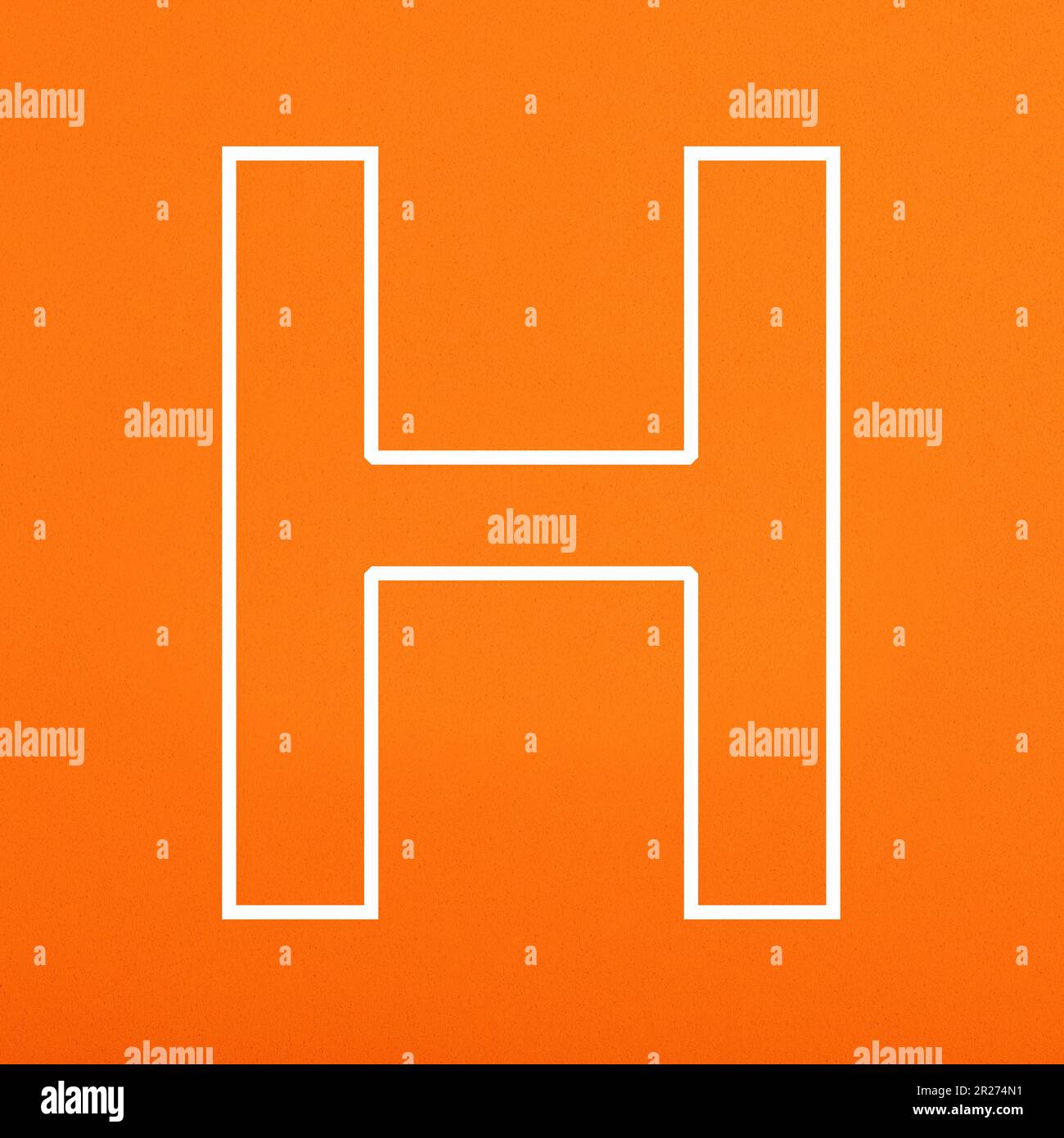 White letter H uppercase on orange foamy background Stock Photo - Alamy