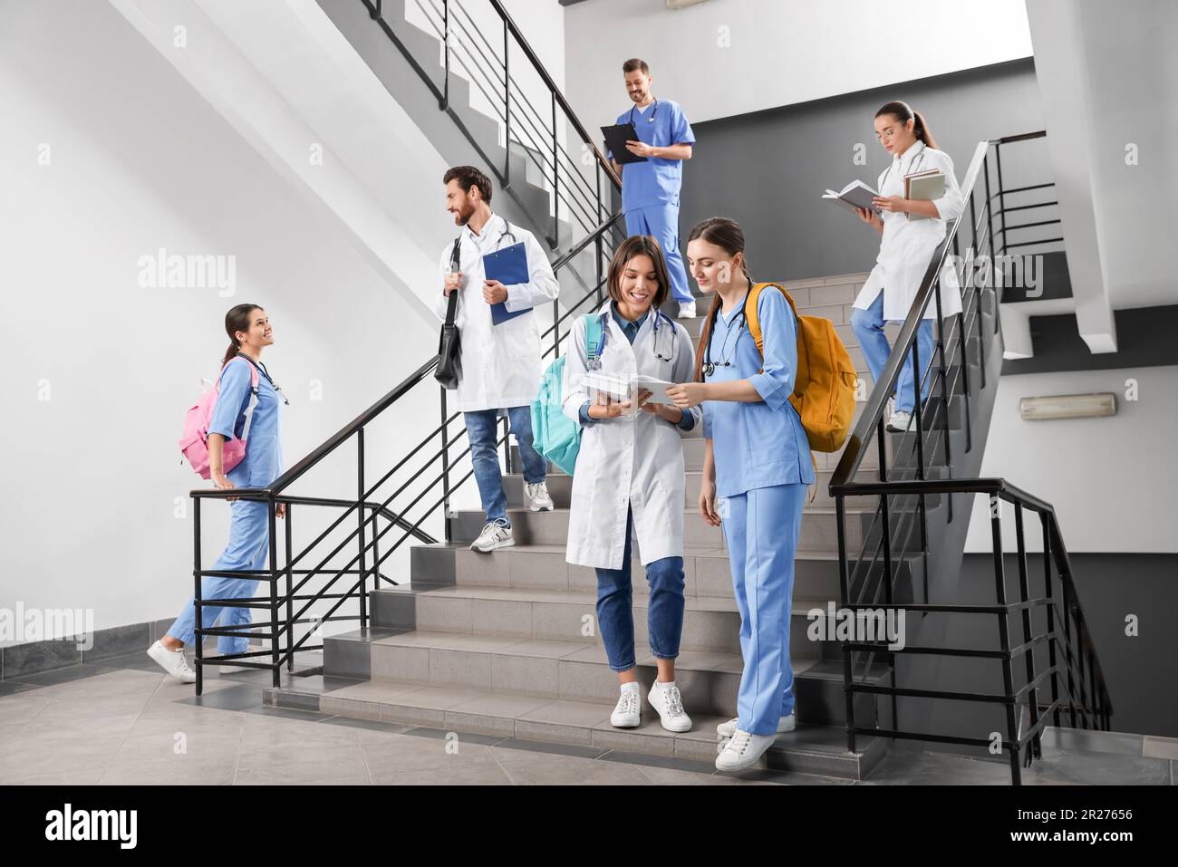 Medical students wearing uniforms on staircase in college Stock Photo ...