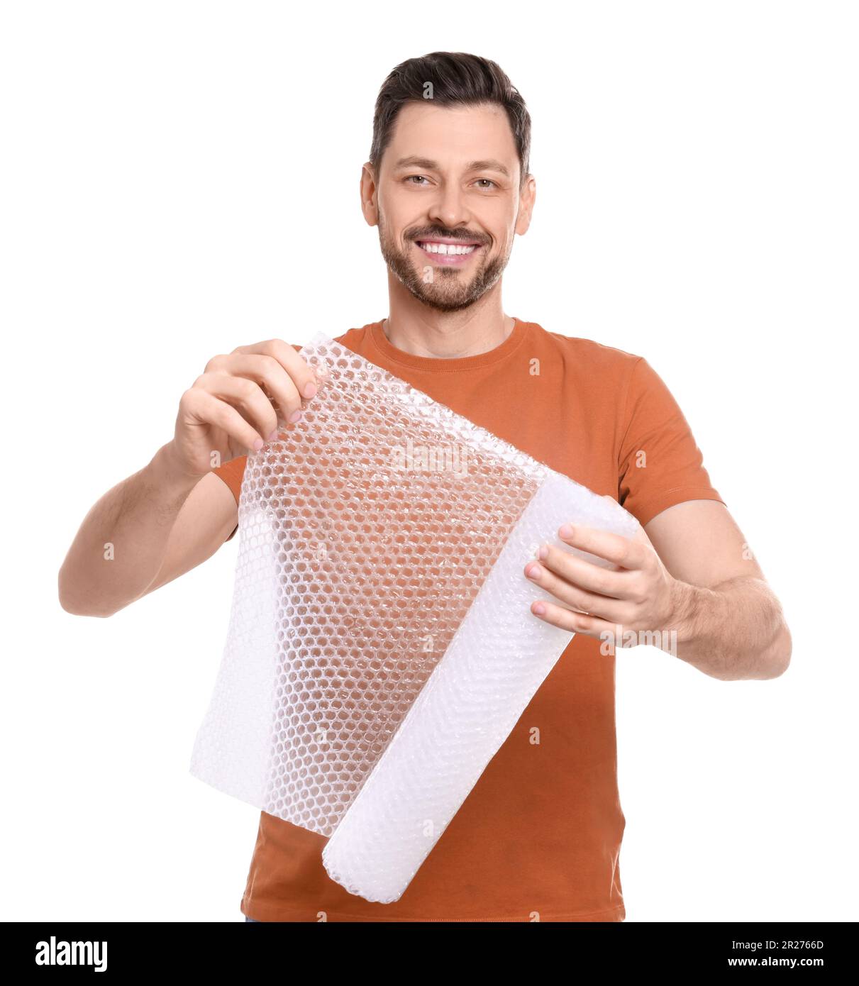Man holding roll of bubble wrap on white background. Stress relief ...