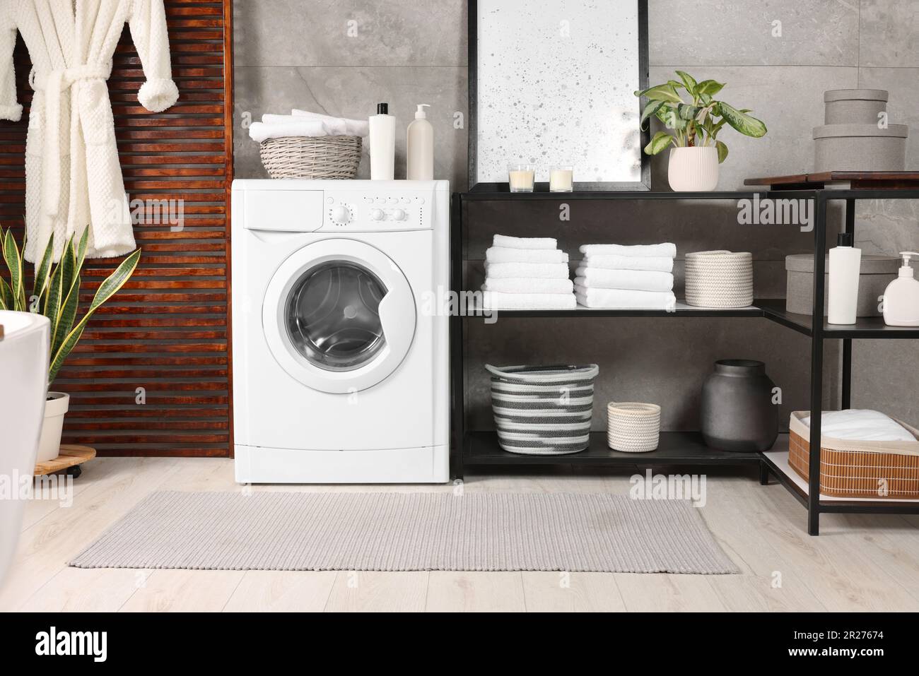 Stylish laundry room with modern washing machine. Interior design Stock ...