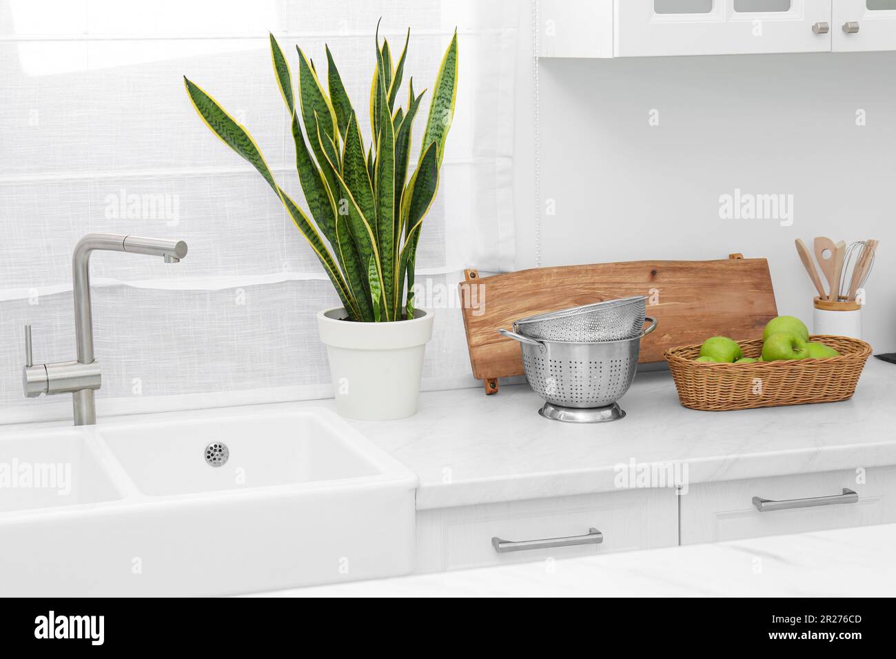 Modern sink and water tap in kitchen. Interior design Stock Photo - Alamy