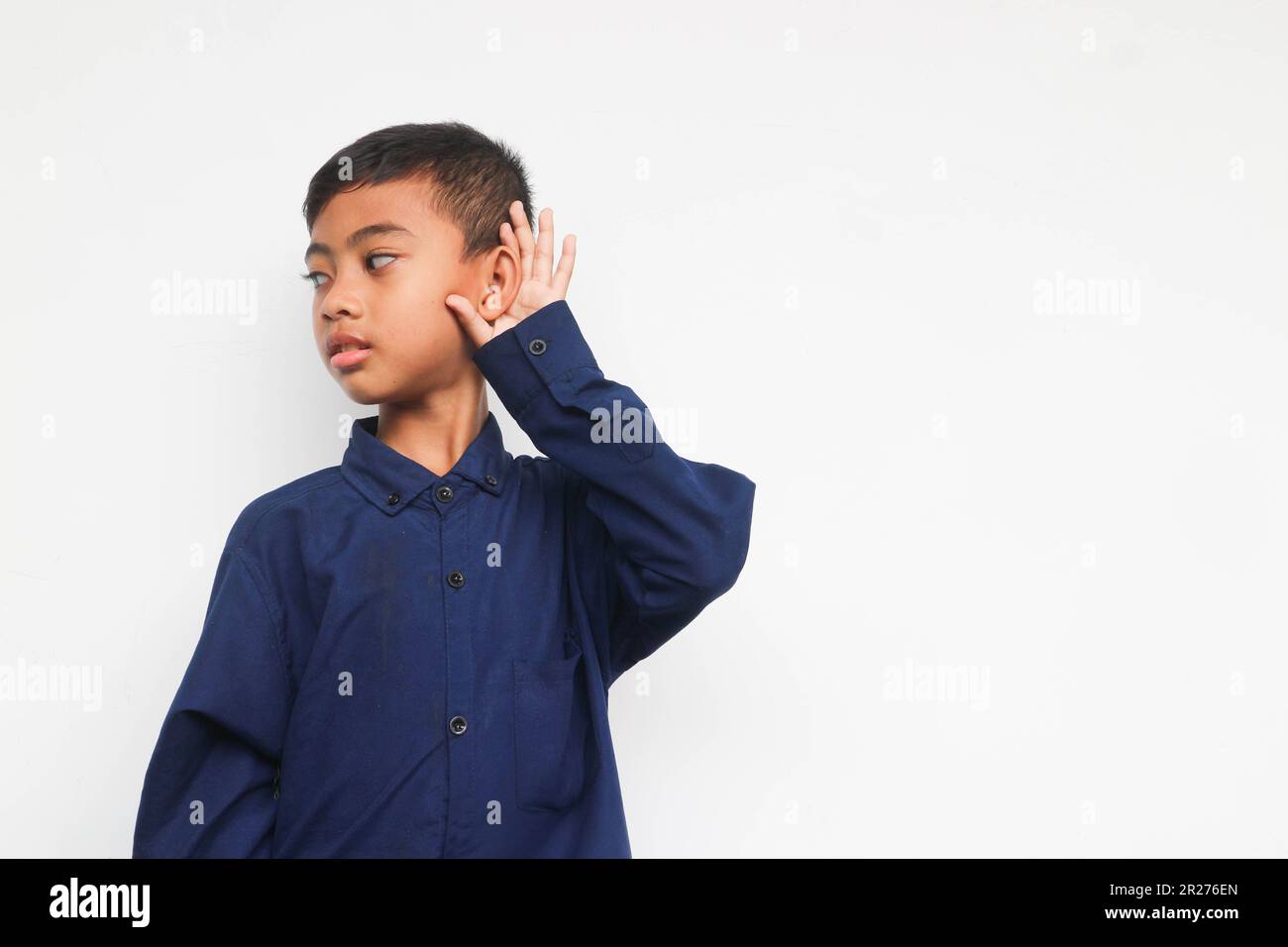 Kid with blue shirt hi-res stock photography and images - Alamy