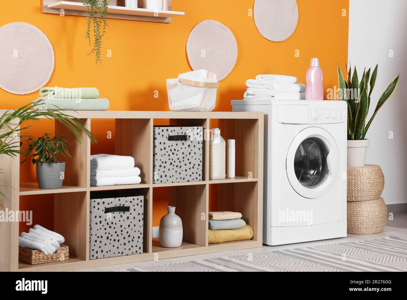 Stylish laundry room with washing machine. Interior design Stock Photo ...