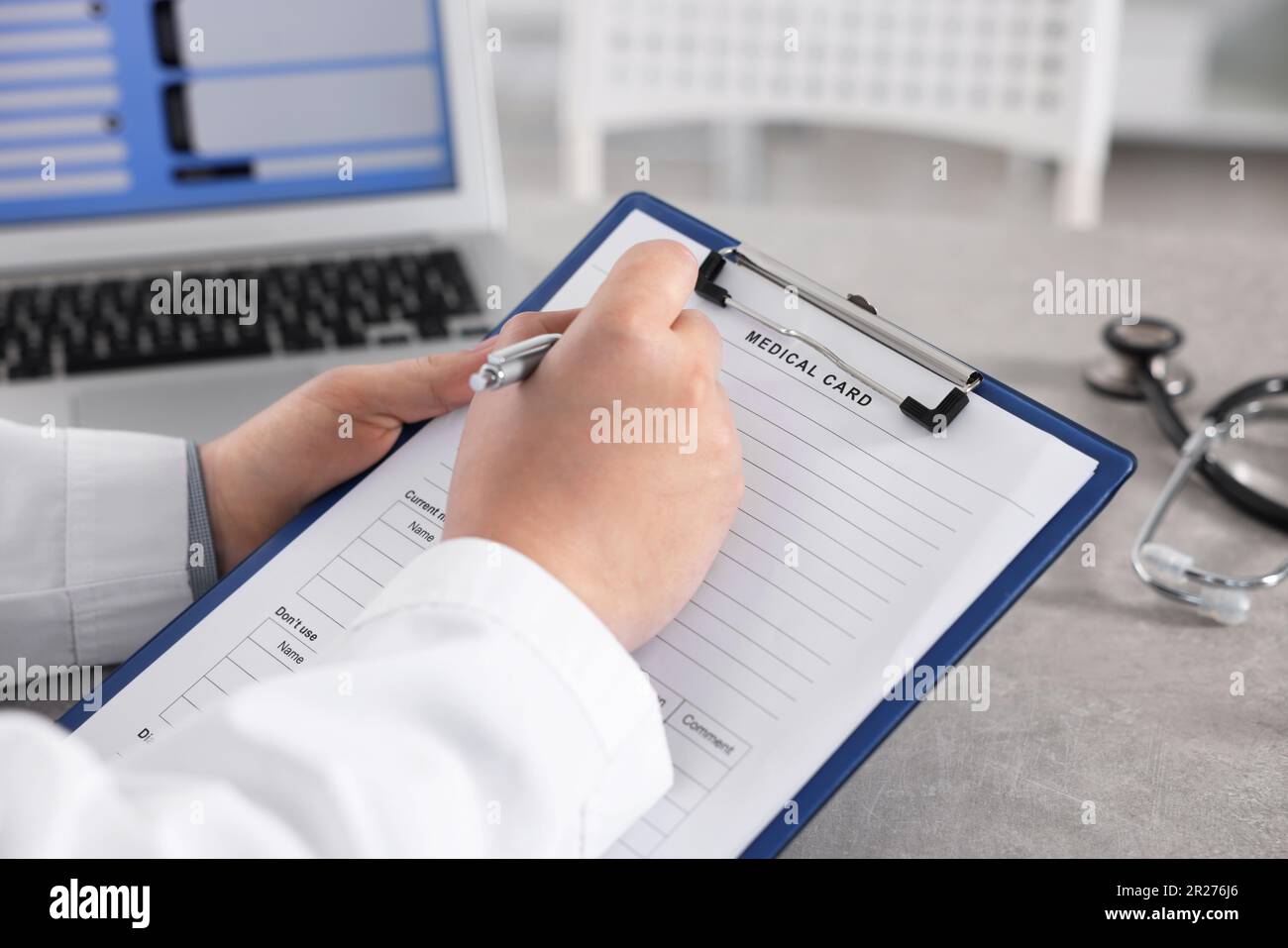 Doctor card filling out hi-res stock photography and images - Alamy