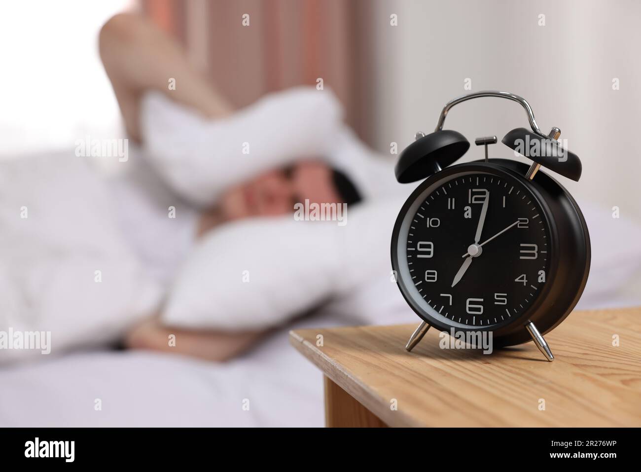 Pillows and alarm clock hi-res stock photography and images - Alamy