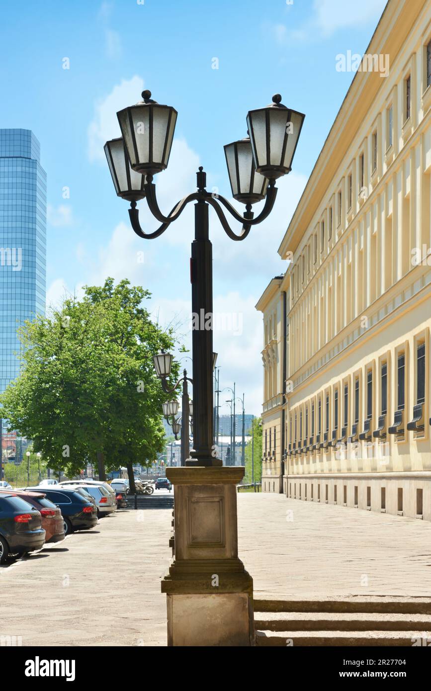 Beautiful old fashioned streetlight near building on city street Stock ...