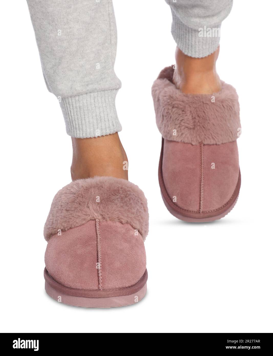 Female legs in slippers Cut Out Stock Images & Pictures - Alamy