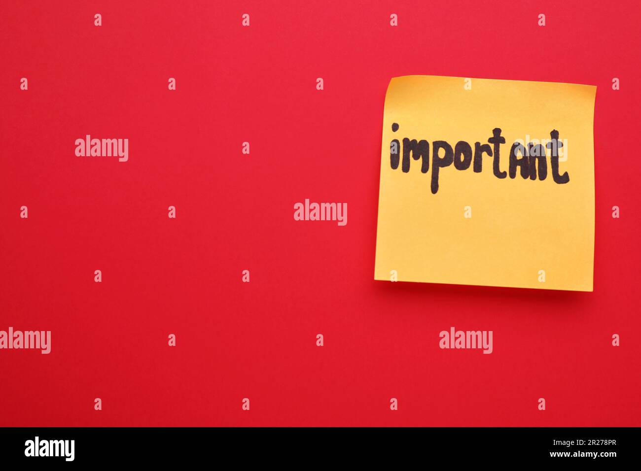 Paper note with word Important on red background, top view. Space for ...