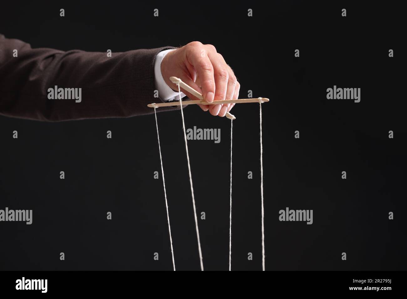 Man hand puppet strings hi-res stock photography and images - Alamy