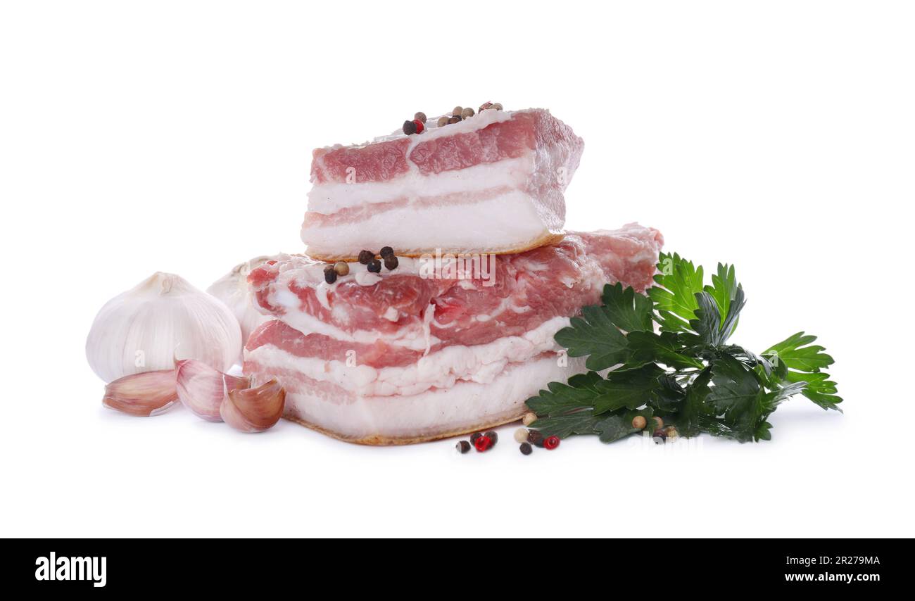 Pieces of pork fatback served with different ingredients isolated on ...