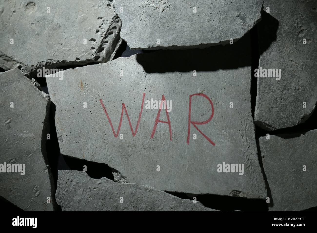 Word War written on piece of concrete, top view Stock Photo - Alamy