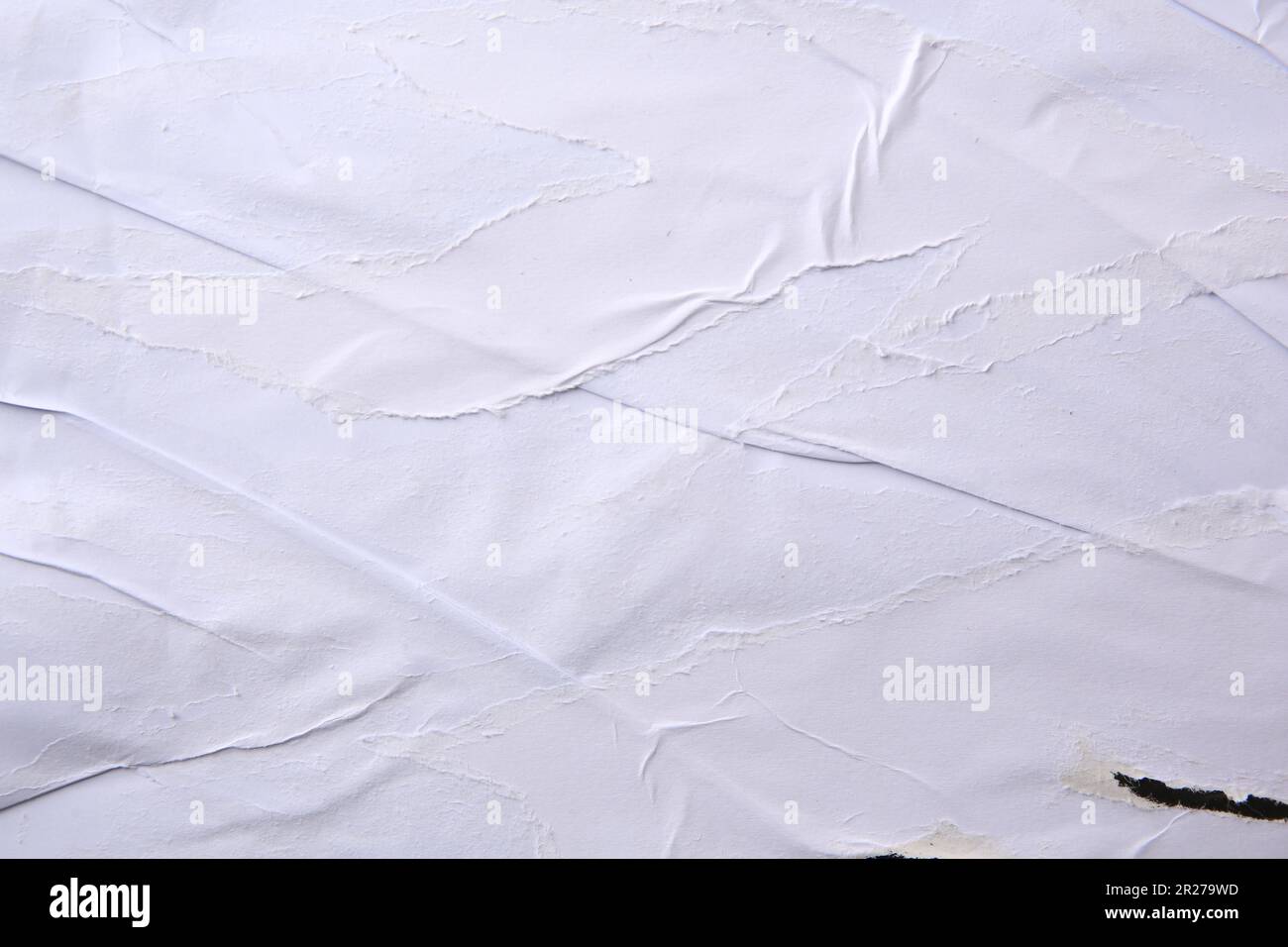 Texture of ripped paper poster, closeup view Stock Photo - Alamy