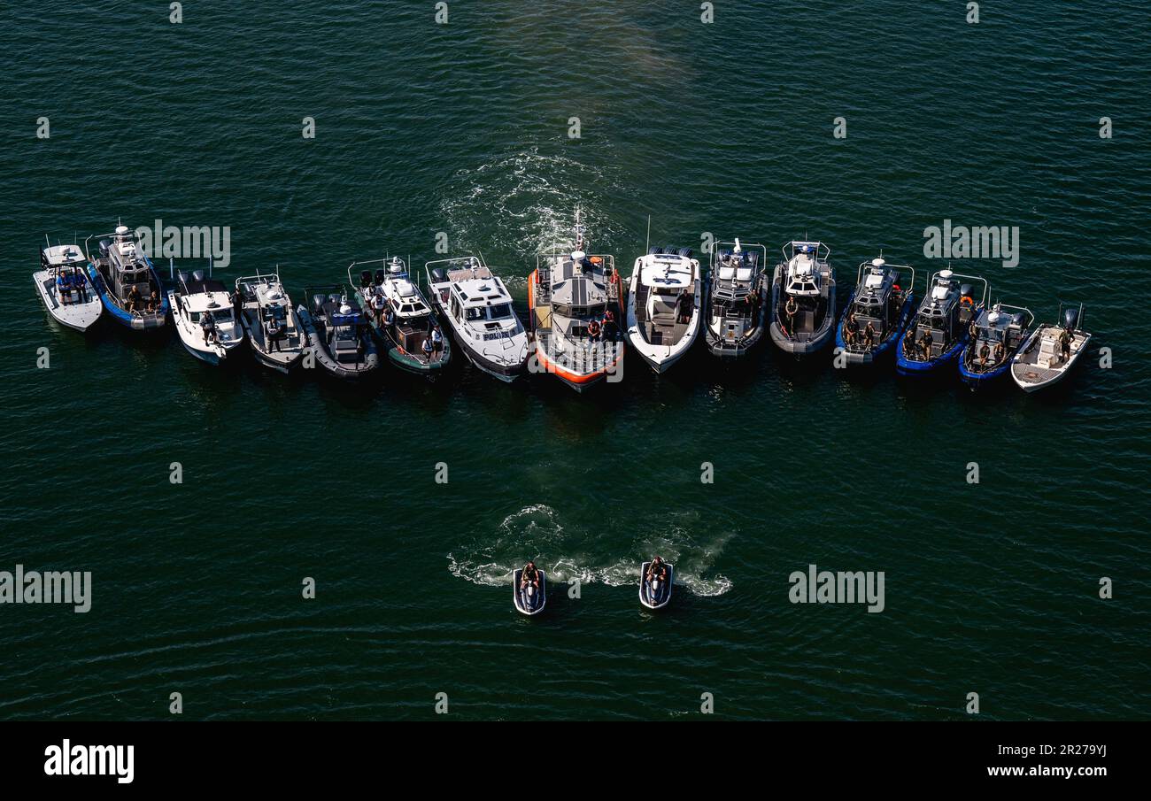 Seventeen U.S. marine vessels line up in formation in Hillsborough Bay ...