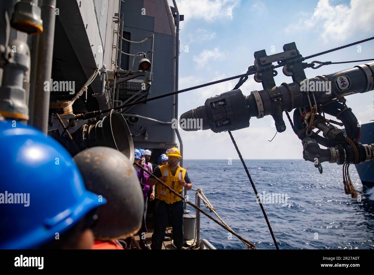 230517-N-KW492-0287 PHILIPPINE SEA (May 17, 2023) Sailors observe as the fueling probe of the ...