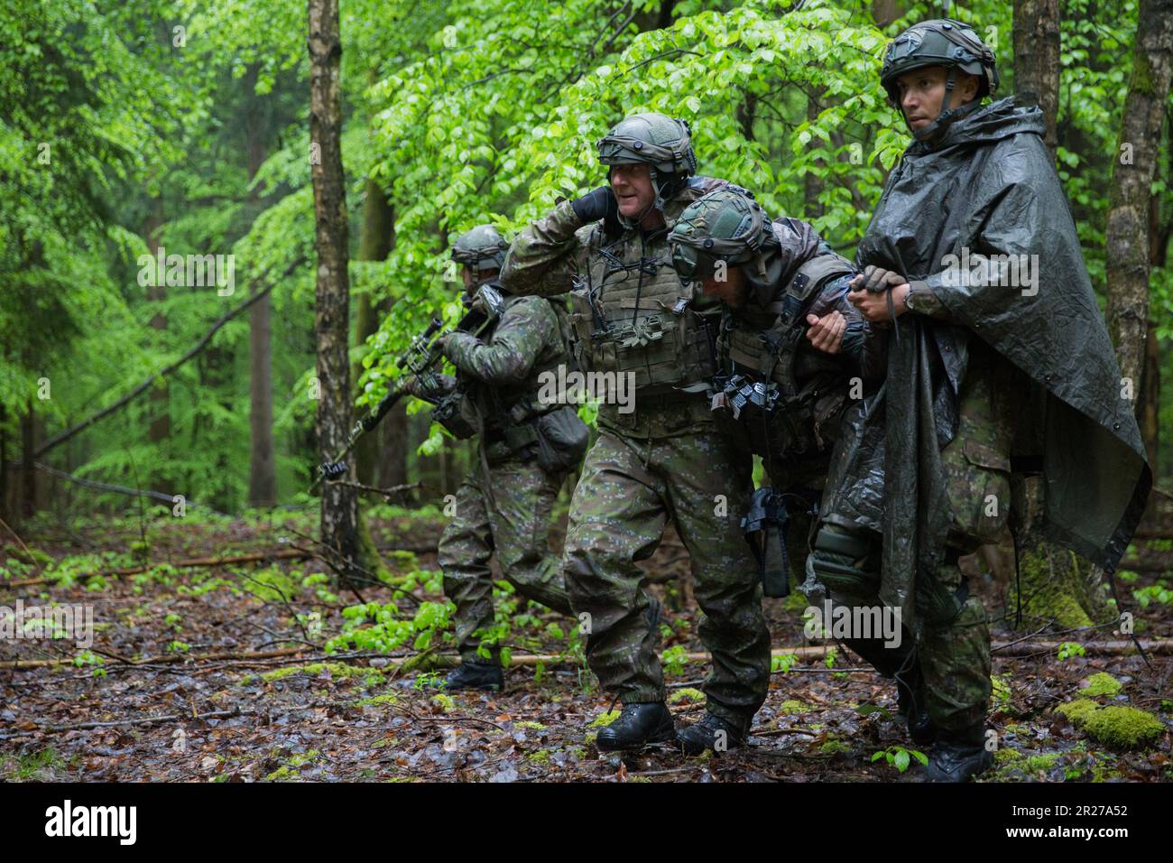 Slovak soldiers assigned to the Slovakian 22nd Mechanized Infantry ...