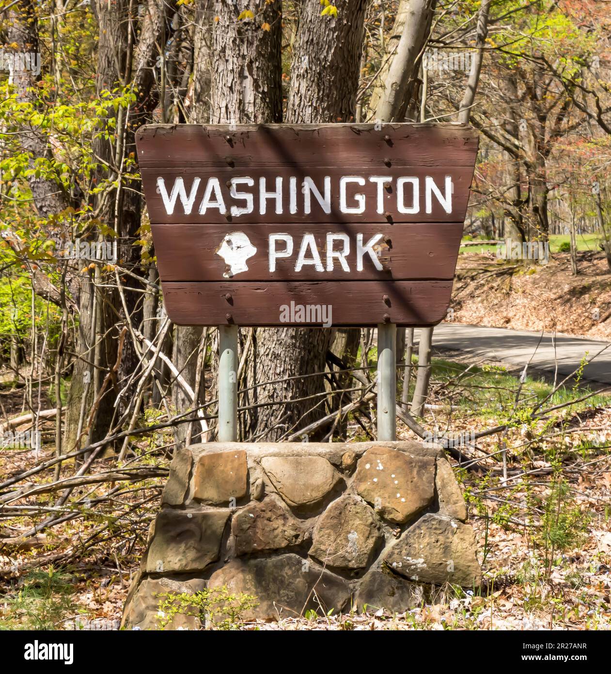 A wooden sign for Washington Park, named after George Washington in ...