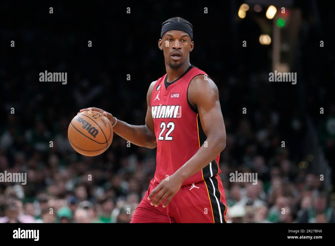 Miami Heat forward Jimmy Butler (22) moves the ball down court in the ...