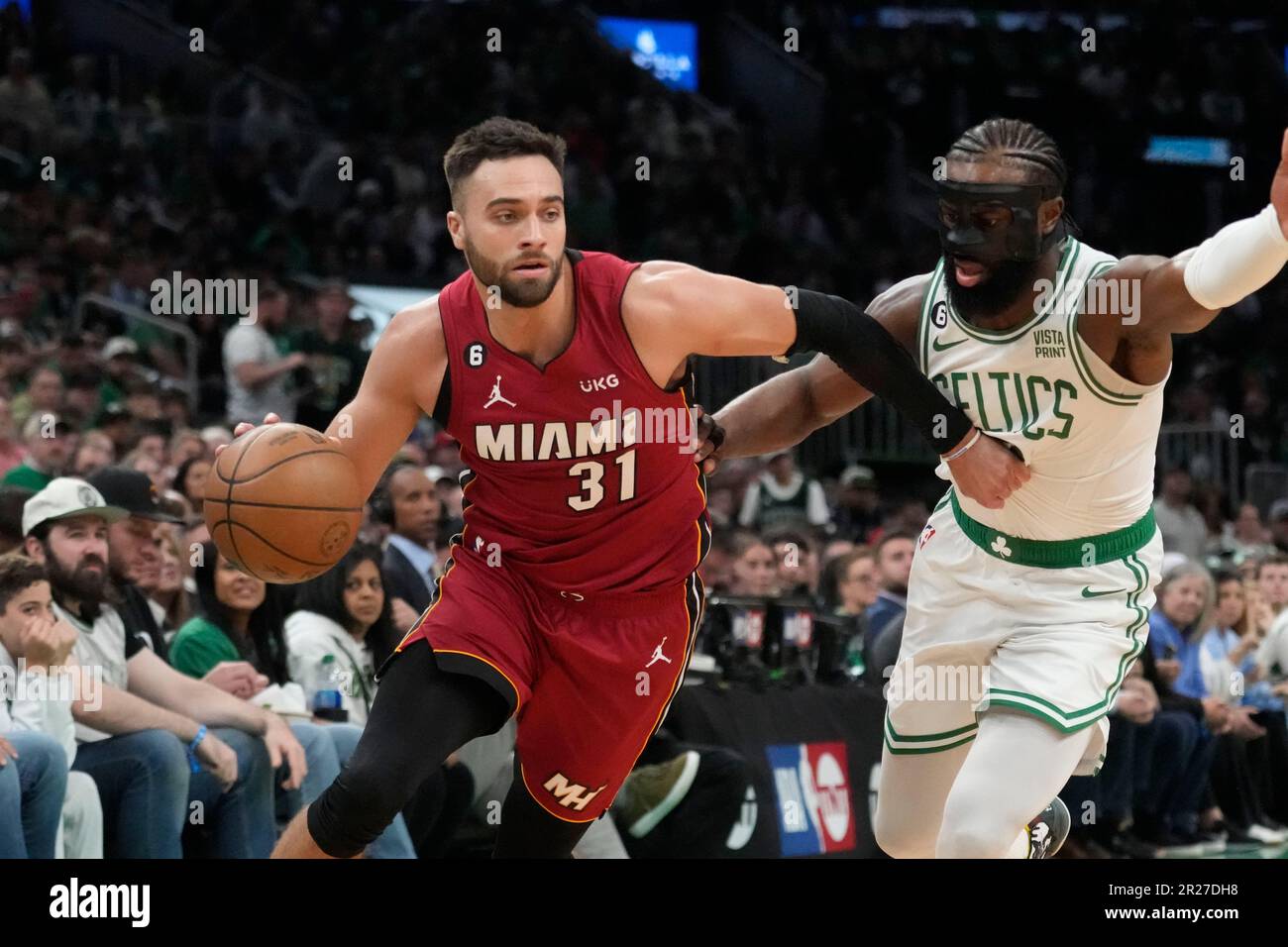 Miami Heat guard Max Strus (31) drives to the basket against Boston ...