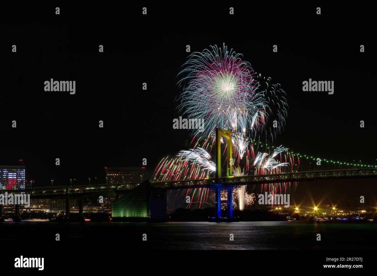Rainbow Bridge and the Odaiba rainbow fireworks Stock Photo - Alamy