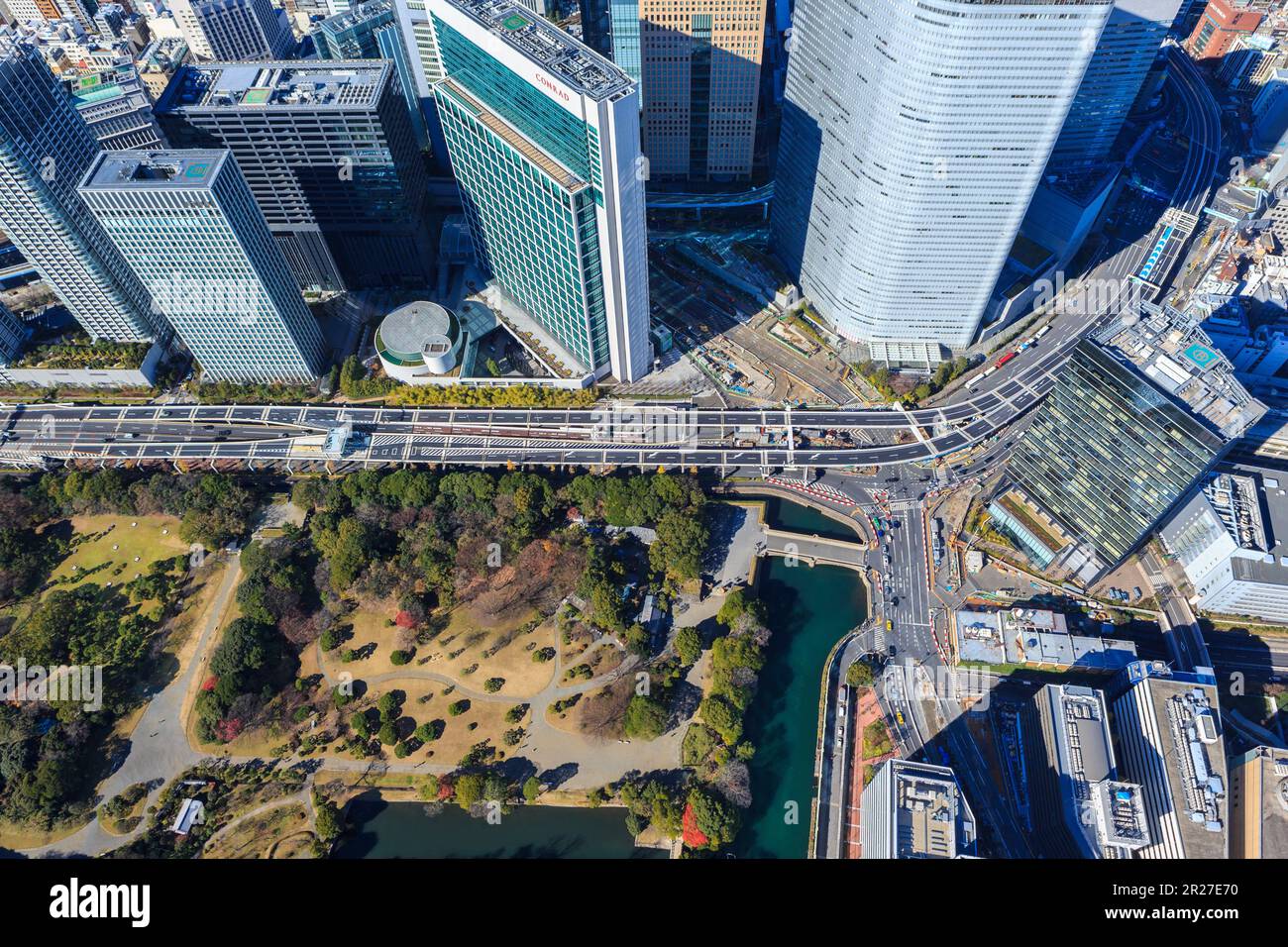 Buildings in Shiodome and Hamarikyu Garden as seen from the sky above ...