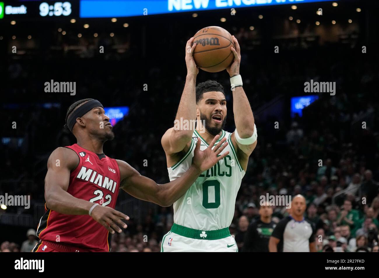 Boston Celtics forward Jayson Tatum (0) battles with Miami Heat forward ...