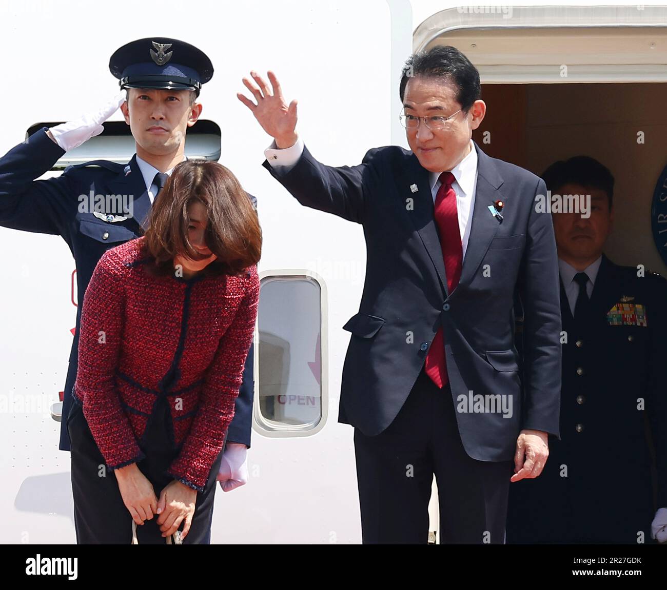 Japanese Prime Minister Fumio Kishida and his spouse Yuko board a ...