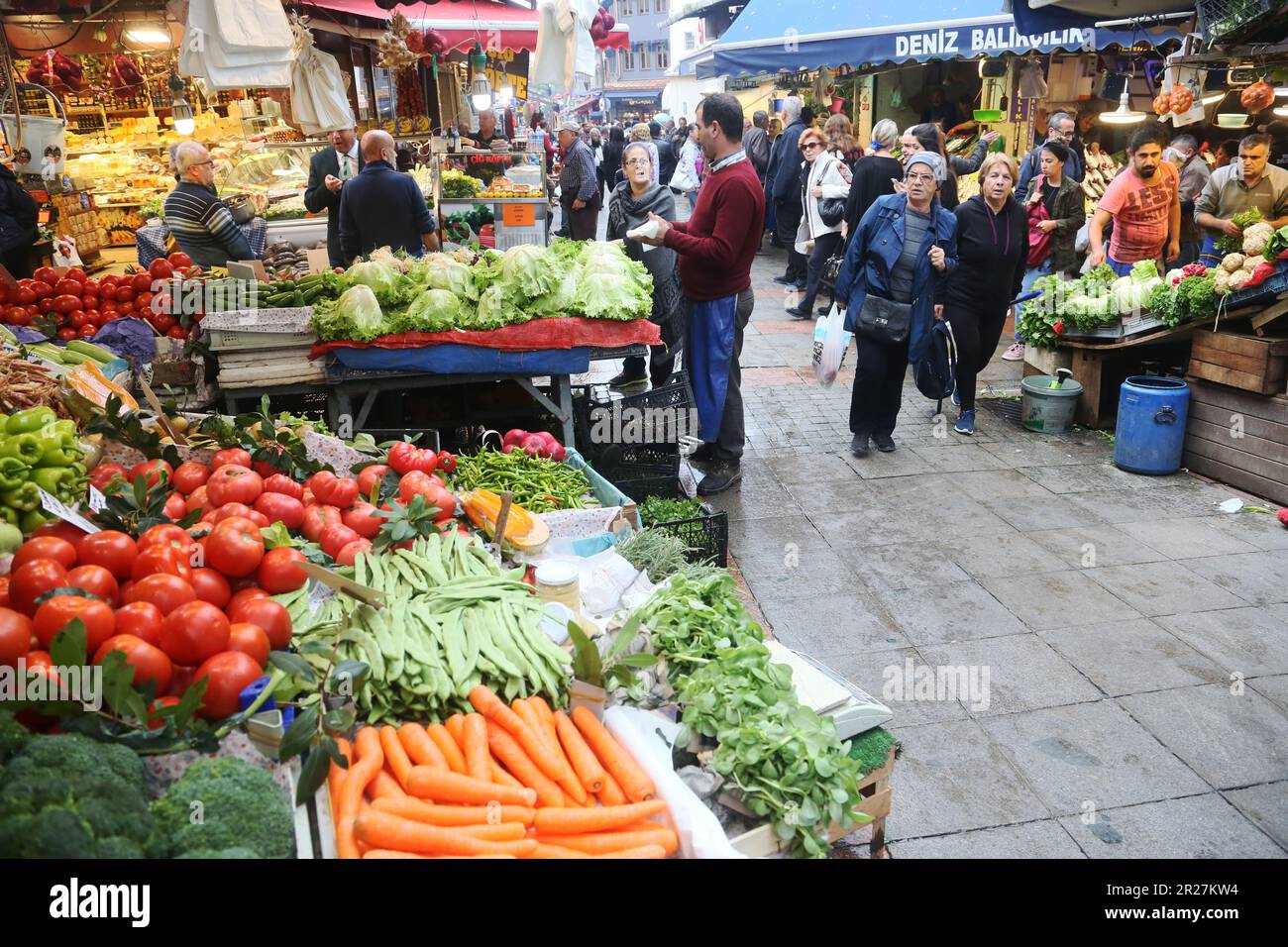 ISTANBUL, TURKEY - OCTOBER 31: People shopping at traditional Kadikoy ...