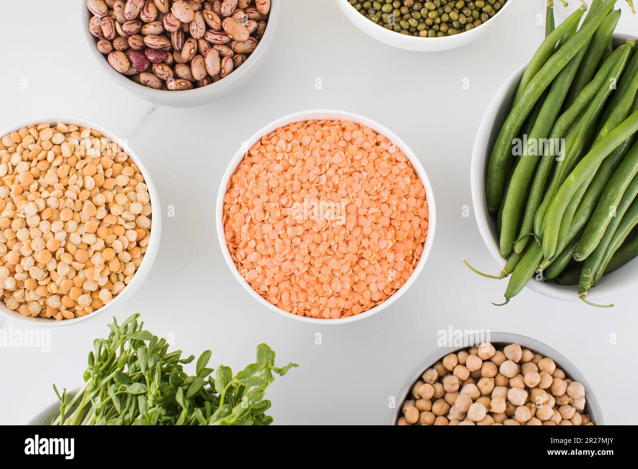 Legumes in glass jars top view. Vegetable protein, vegetarianism ...