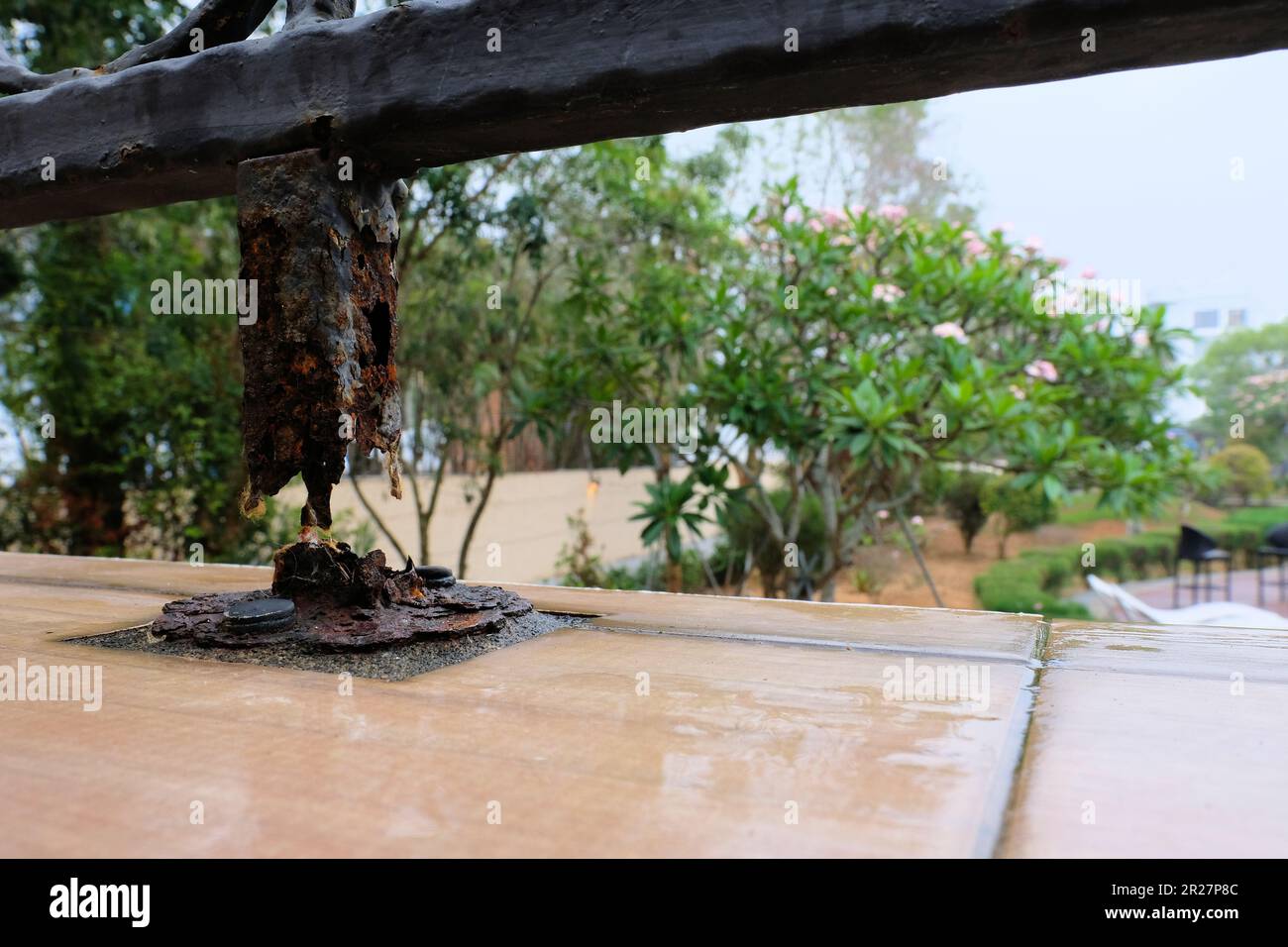 Metal posts containing iron showing corrosion and rust in humid ...