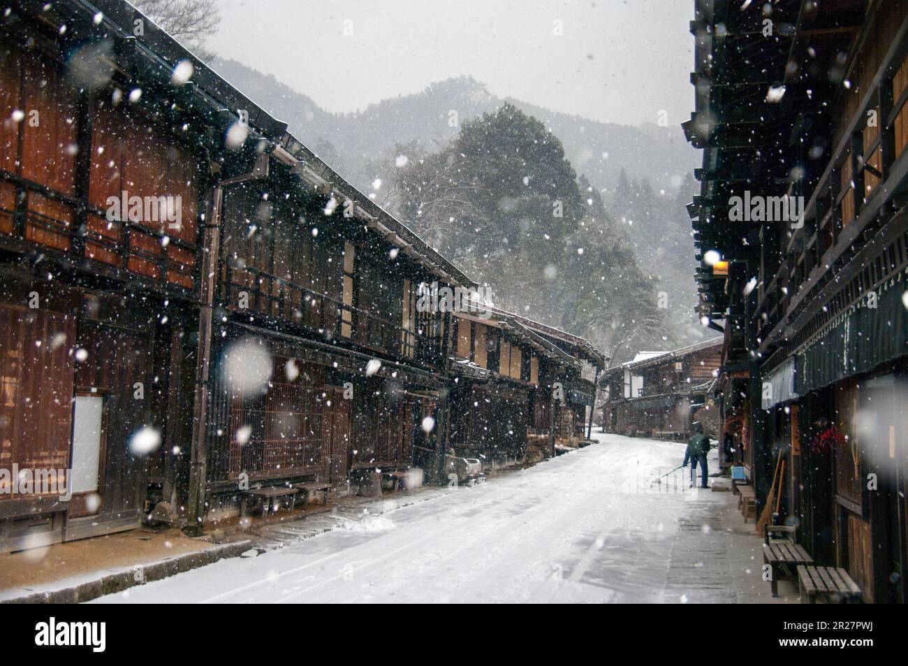 Snow falling on the old town road at Tsumago Inn Stock Photo - Alamy