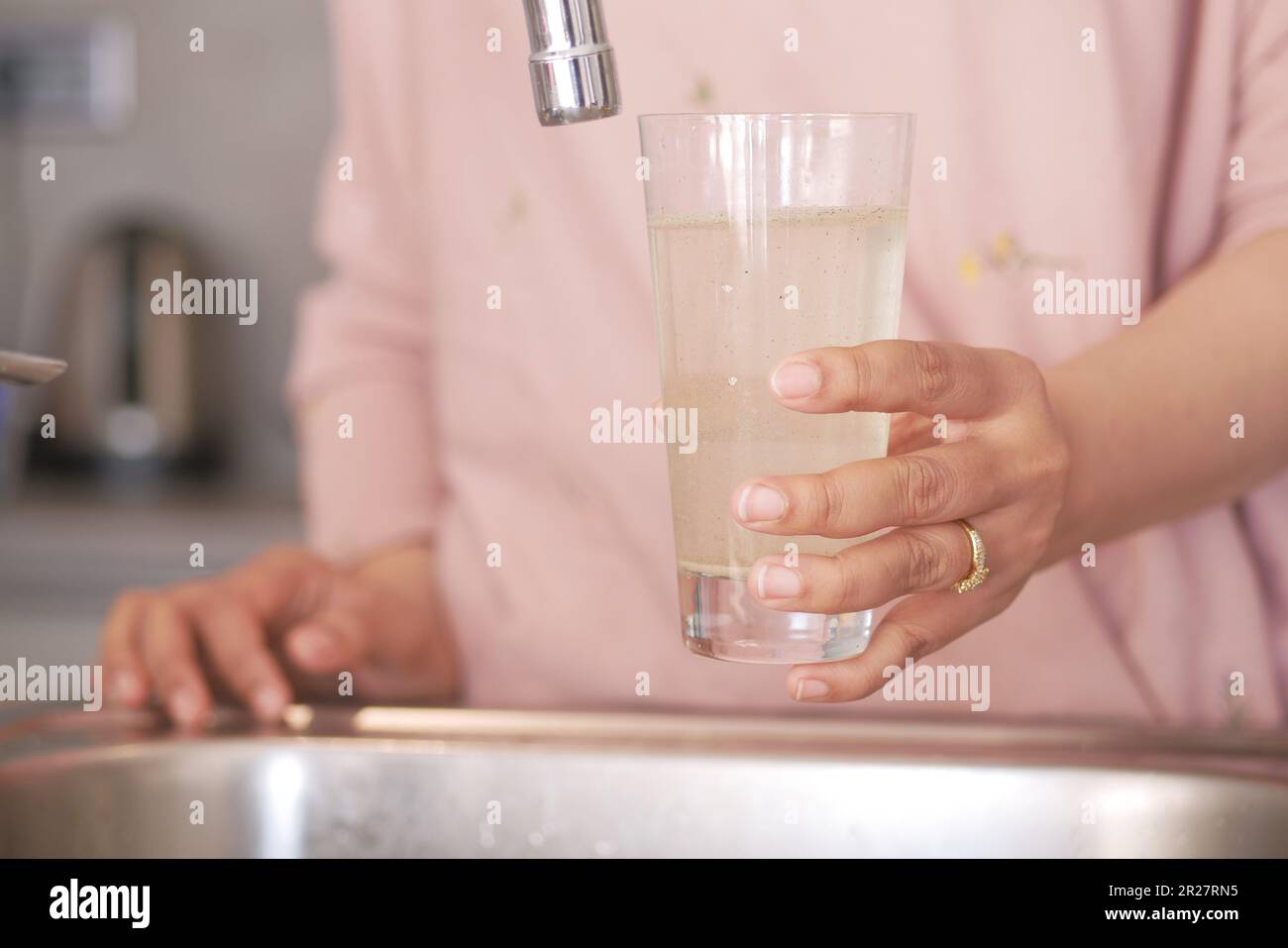 Slow motion pouring water glass hi-res stock photography and images - Alamy