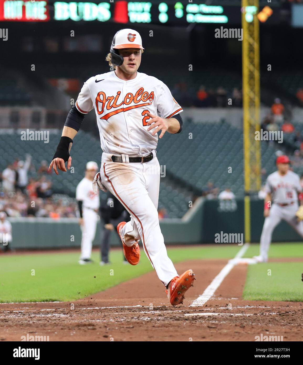 Baltimore Orioles third baseman Gunnar Henderson (2) scores on a line ...