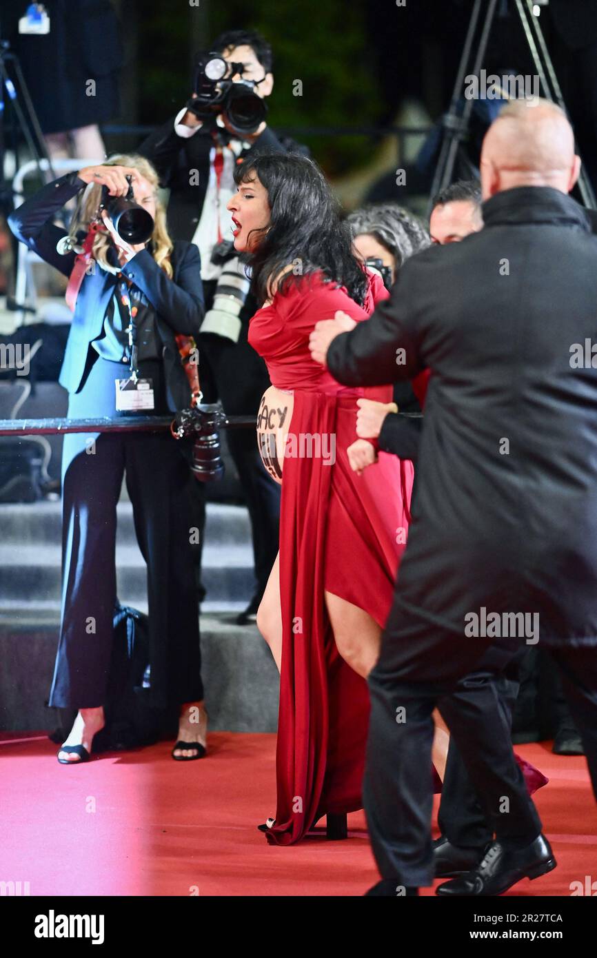 Cannes, France. 17th May, 2023. A protester storms the Le Retour red ...