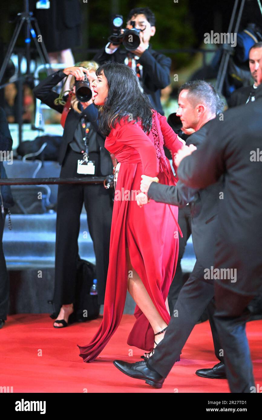 Cannes, France. 17th May, 2023. A protester storms the Le Retour red ...