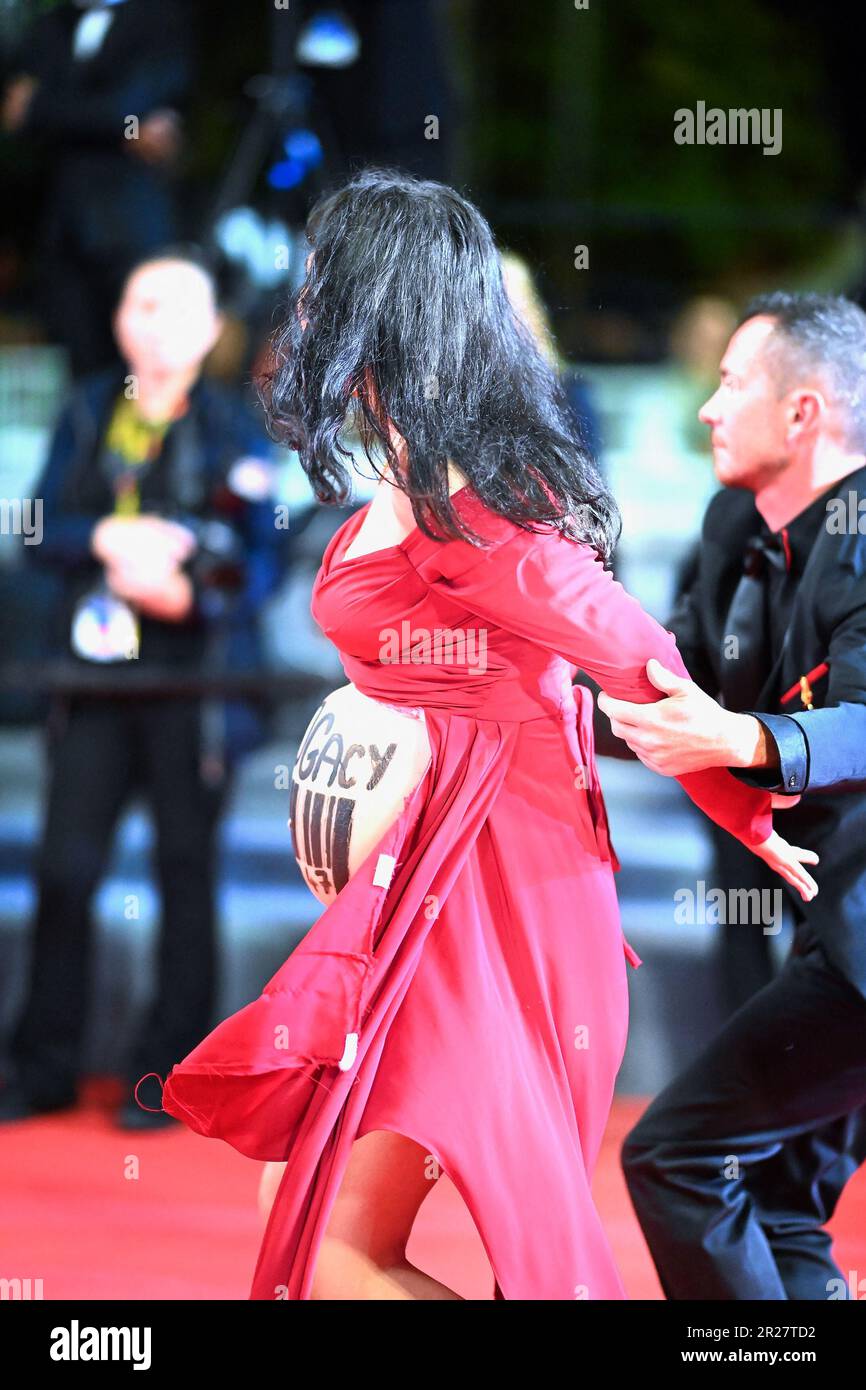 Cannes, France. 17th May, 2023. A protester storms the Le Retour red ...