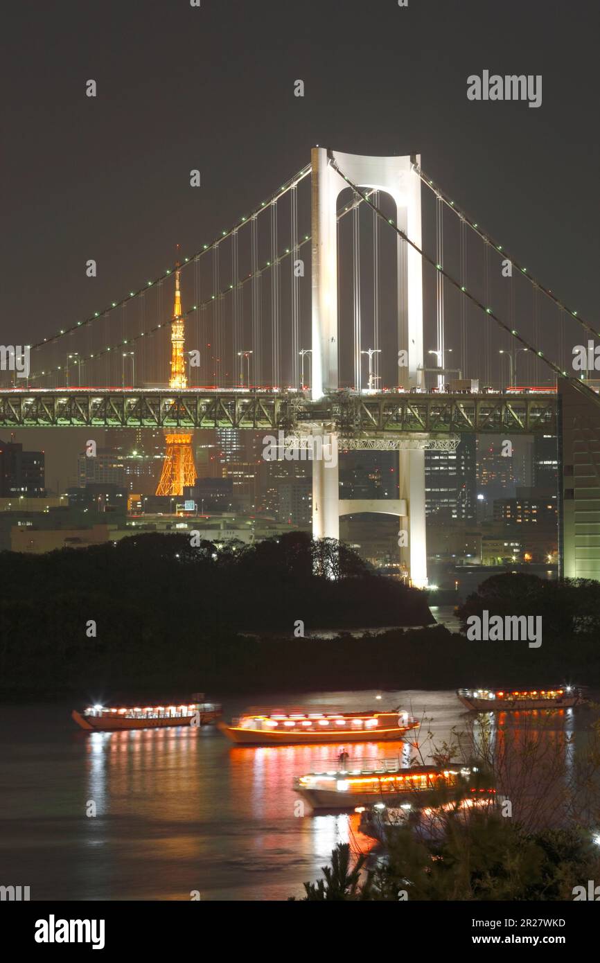 Night view of the Rainbow bridge and houseboats at Odaiba Stock Photo ...