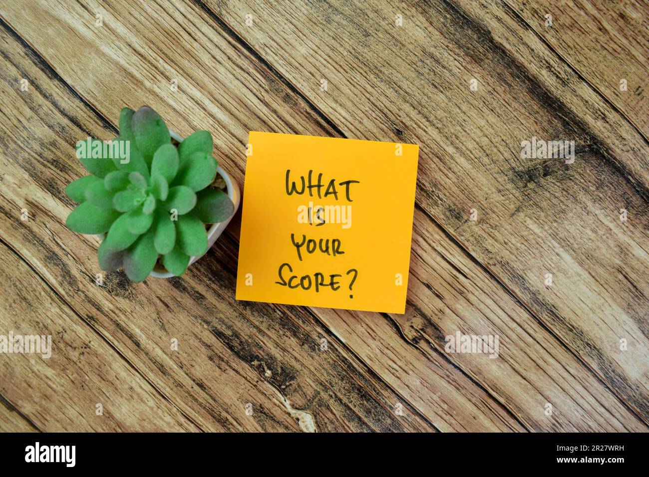 Concept of What is Your Score? write on sticky notes isolated on Wooden ...