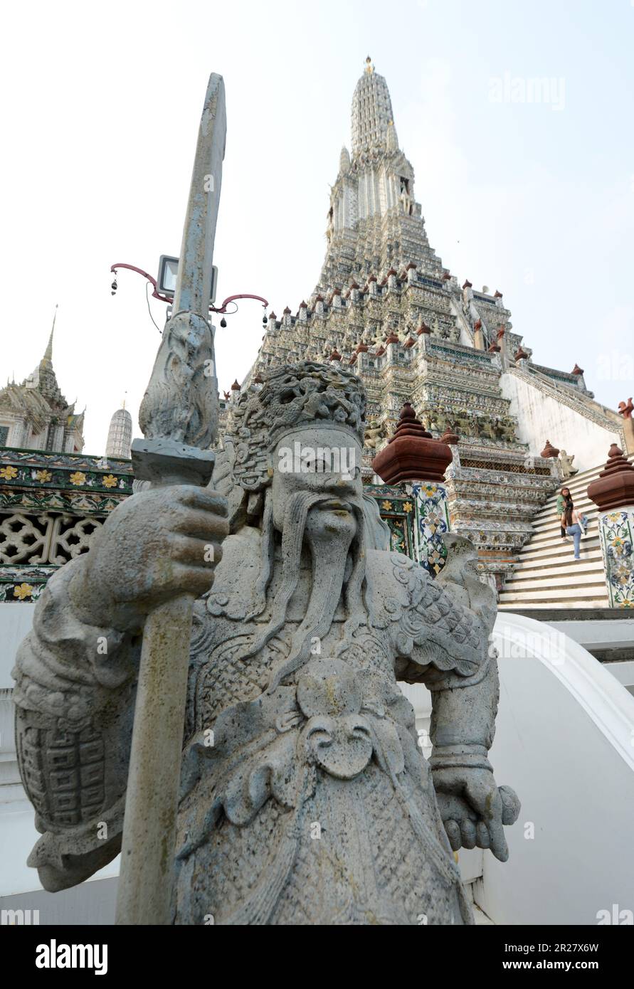 A statue of a guardian by the main pagoda of Wat Arun ( Temple of Dawn ...