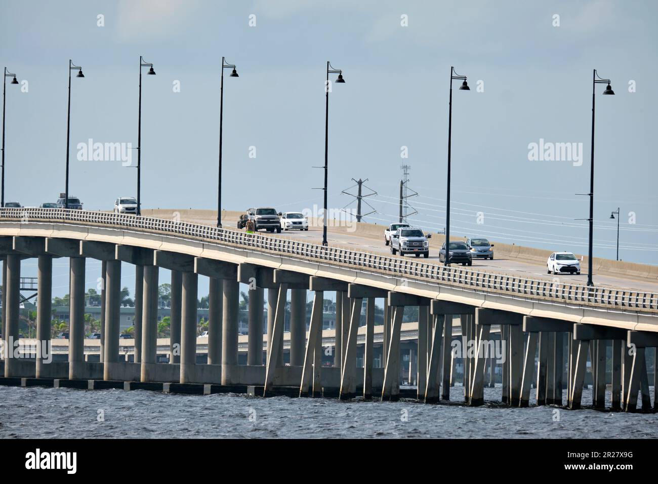 Barron Collier Bridge and Gilchrist Bridge in Florida with moving ...