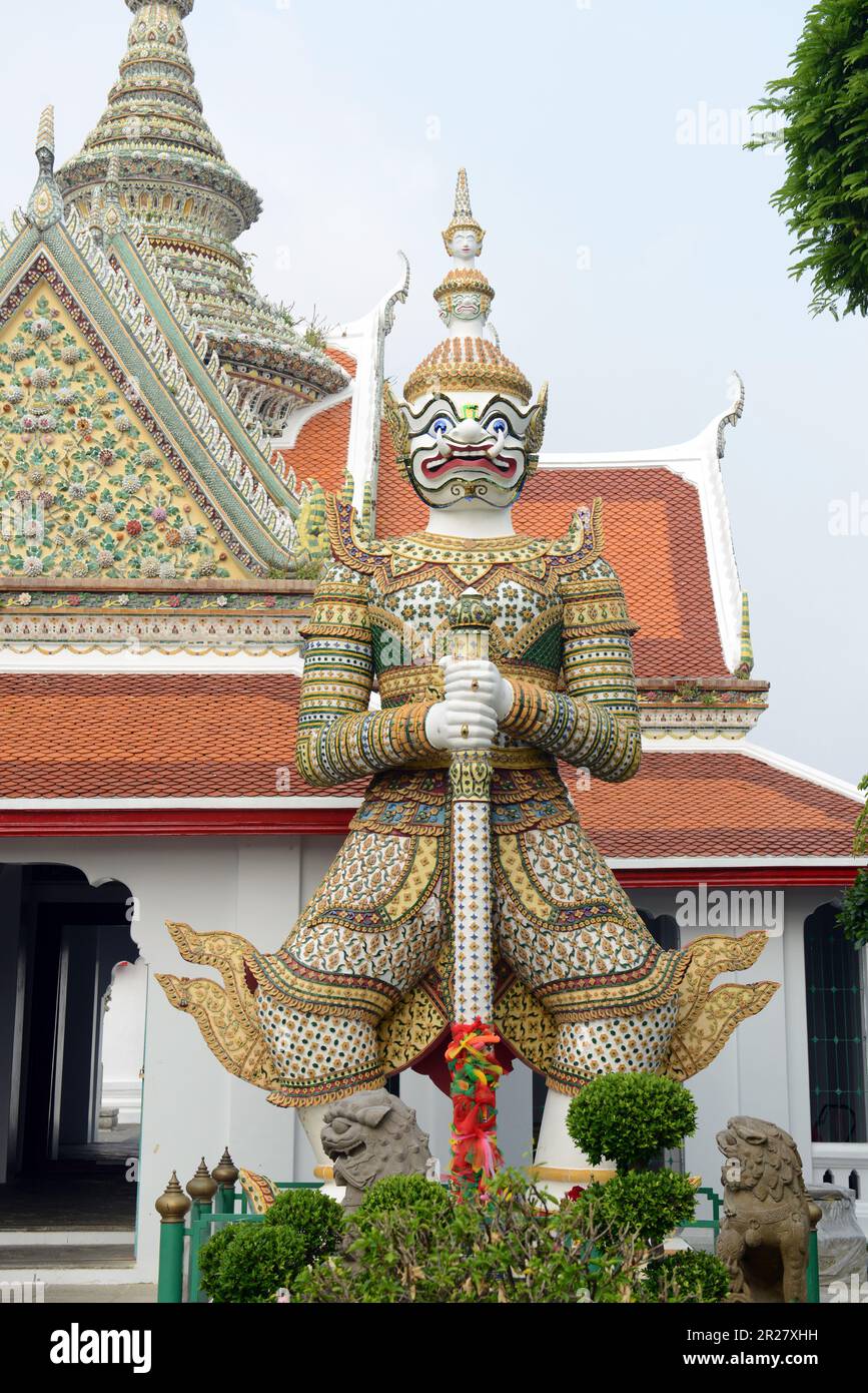 The sculptures of two mythical giant demons, Thotsakan and Sahatsadecha ...
