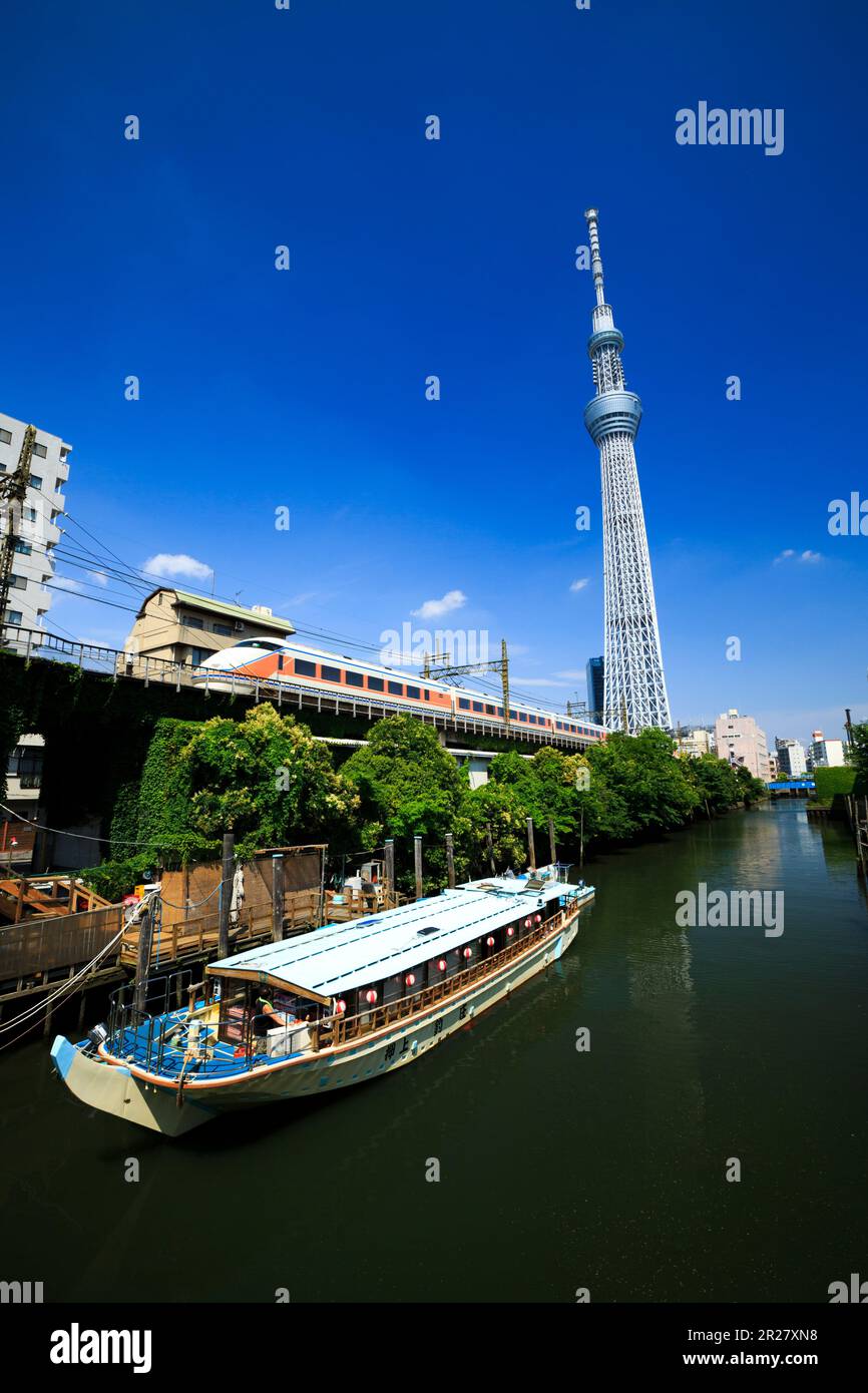 Tokyo Sky Tree, Tobu Isesaki Line and Kitajikkengawa River Stock Photo ...