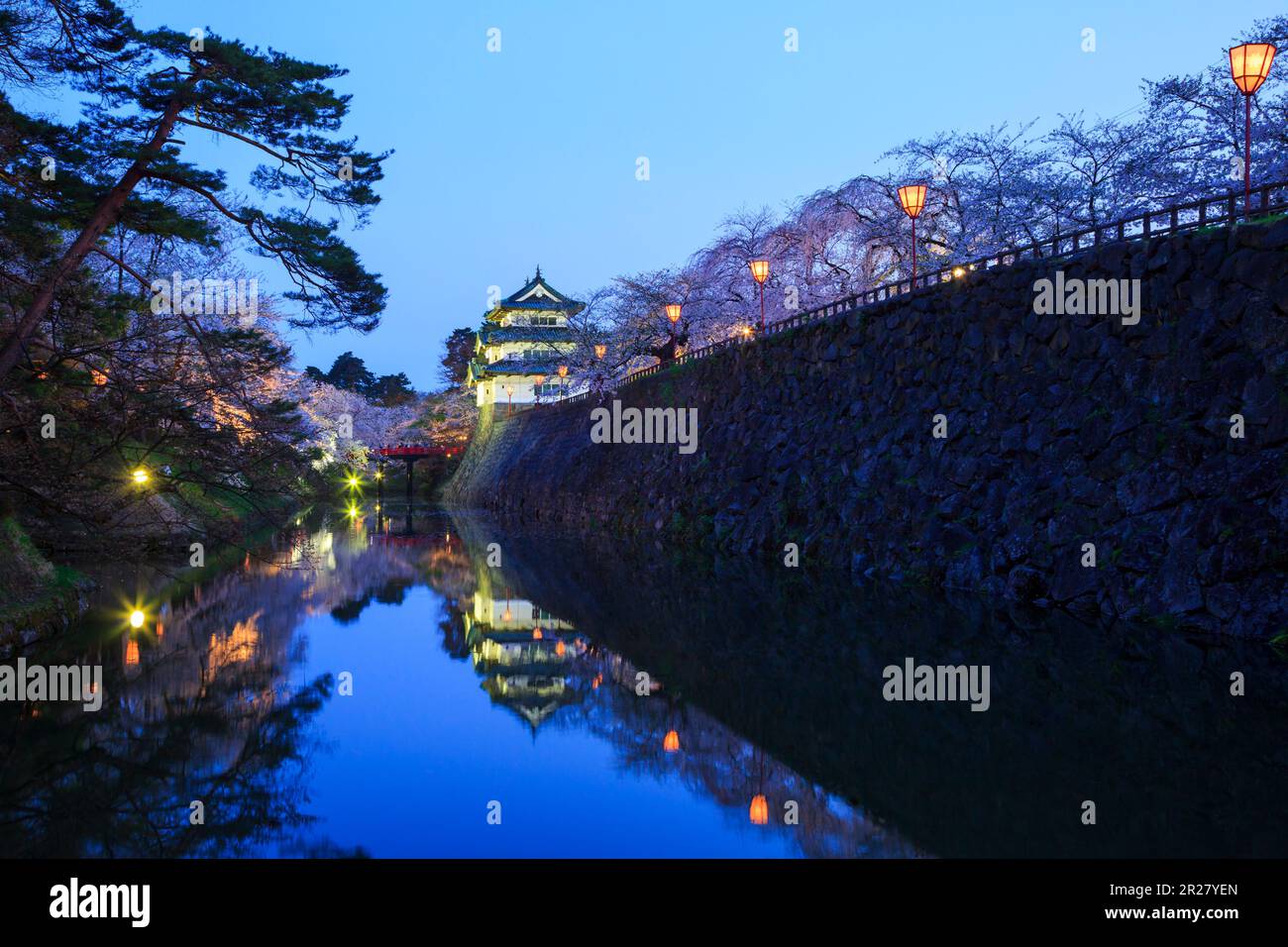 Lit up Hirosaki Castle and inner moat Stock Photo - Alamy
