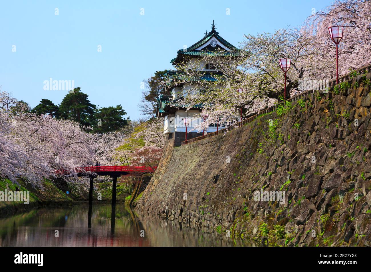 Inner moat, Hirosaki Castle and Gejyo Bridge in cherry blossams ...