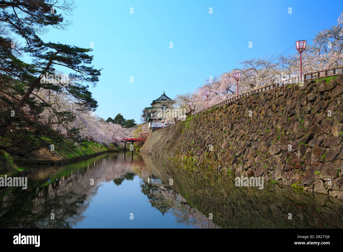 Inner moat, Hirosaki Castle and Gejyo Bridge in cherry blossams ...