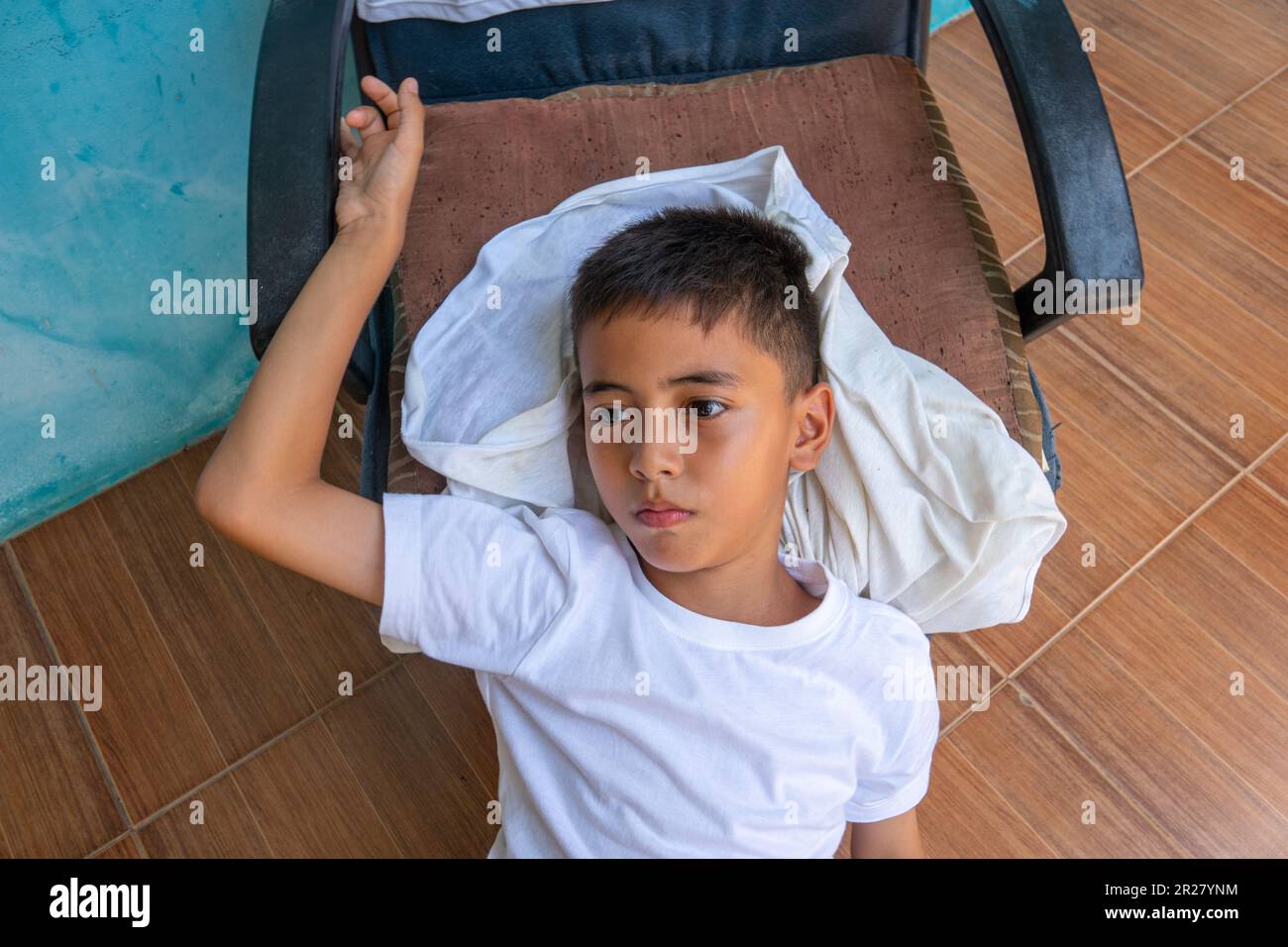 The boy made a sad face when it was time to leave his mother. The cute ...