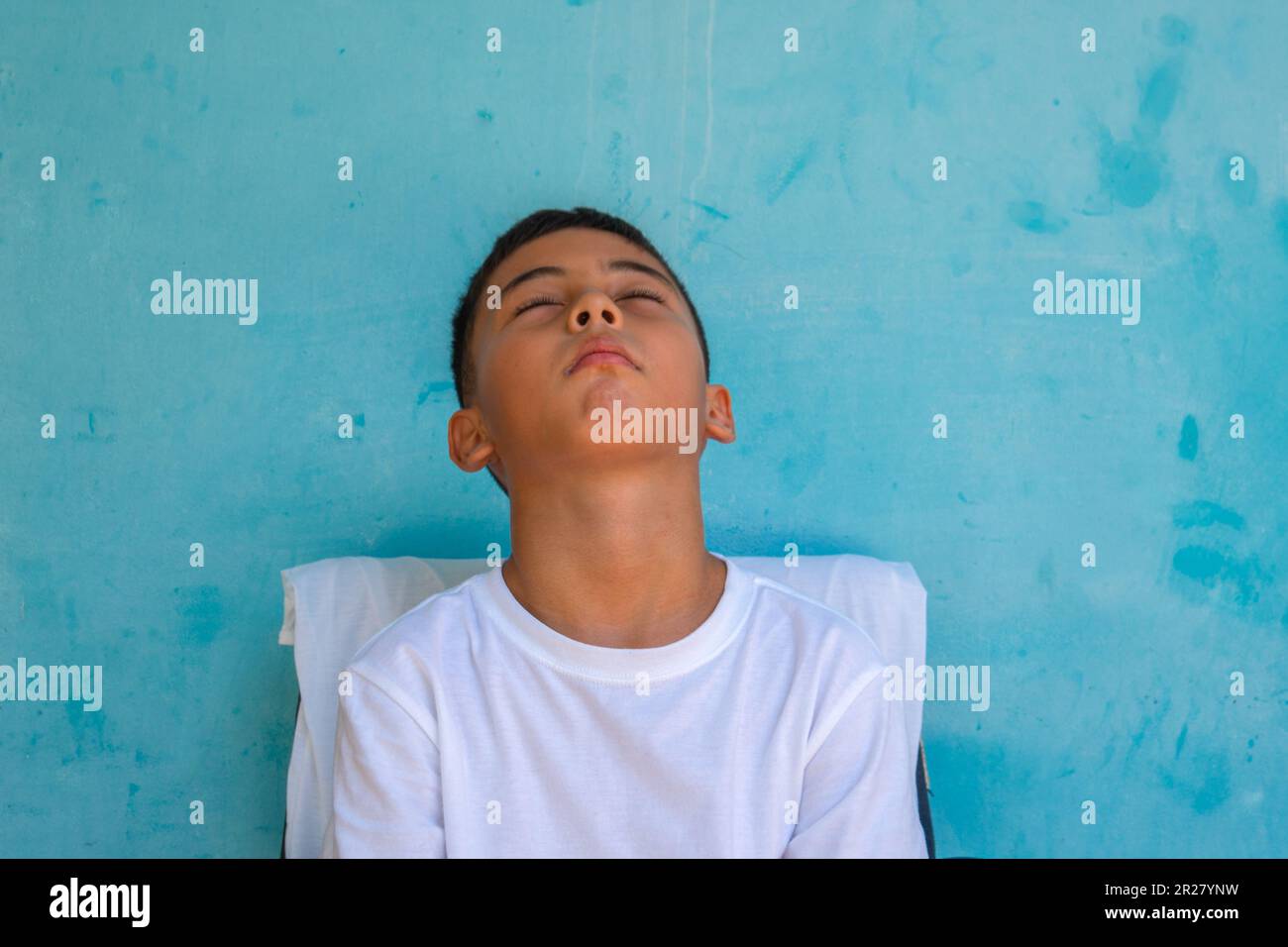 The boy made a sad face when it was time to leave his mother. The cute ...