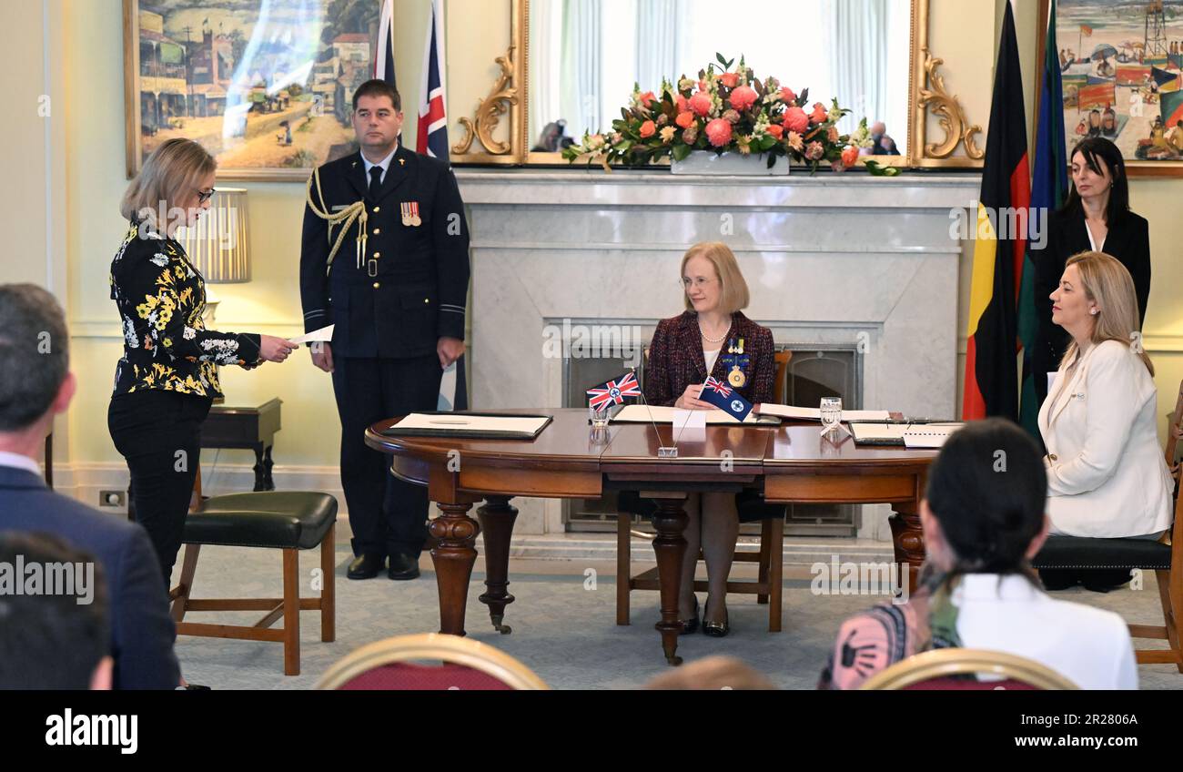 The new Attorney General, Yvette D'Ath (left) is seen being sworn in as ...